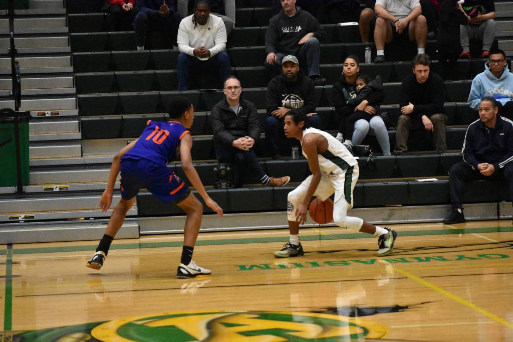 Basketball: Trojans slay Lions, advance to district championship ...